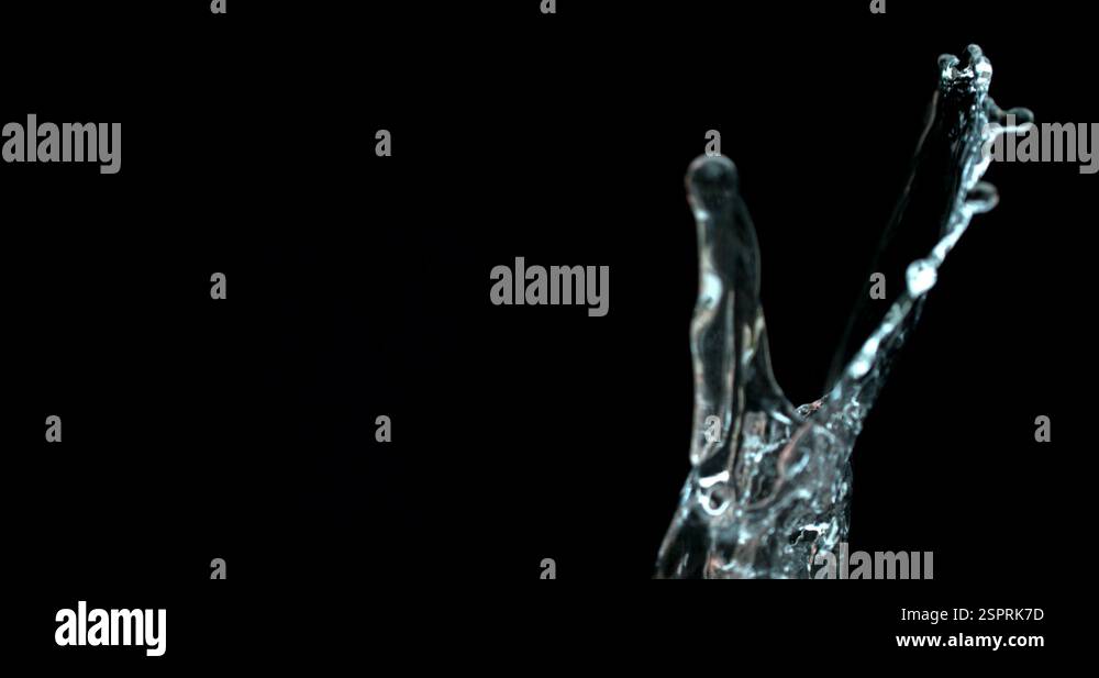 Super slow motion water on black drop shot with high speed camera ...
