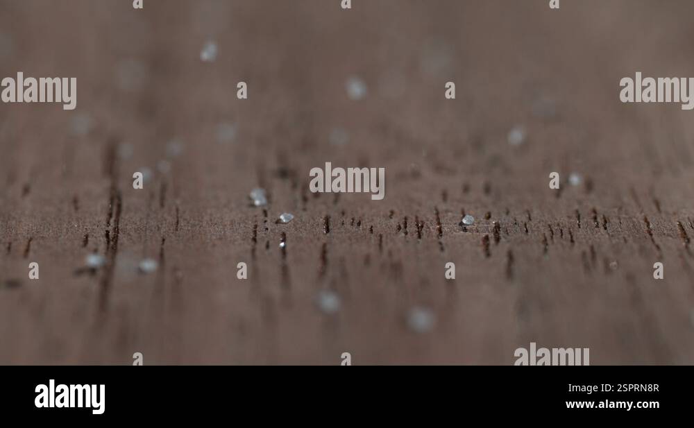 Falling sugar cane granules shot on high speed camera, phantom flex ...