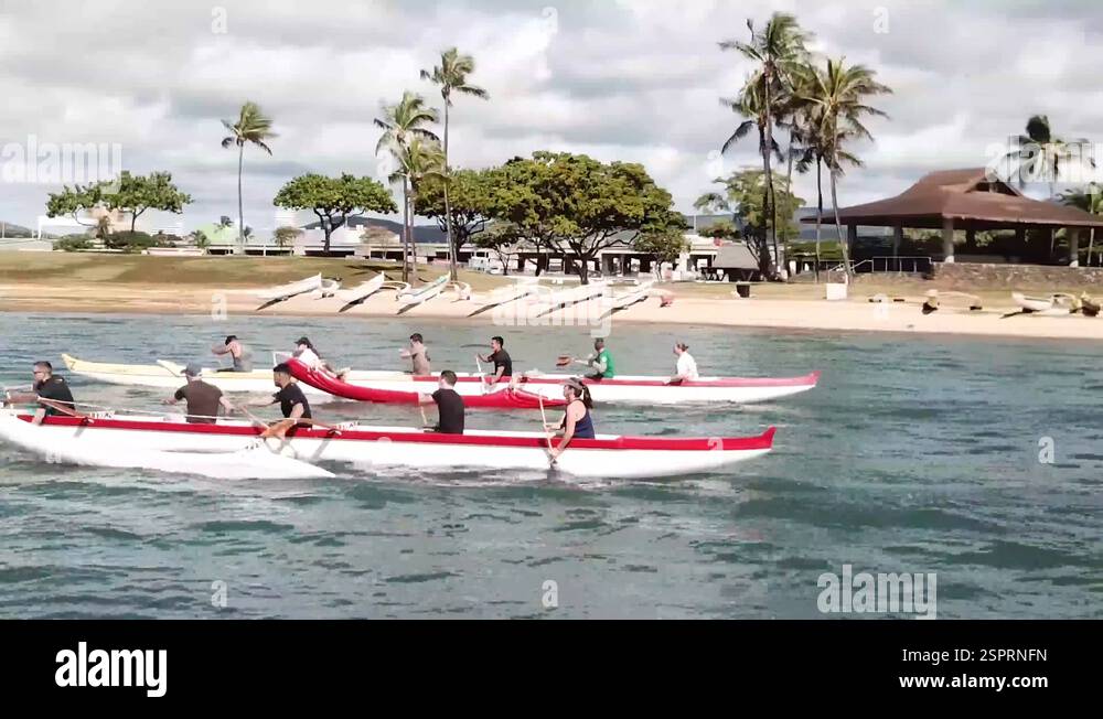 Soldiers competing in rowing competition with Outrigger canoes Stock ...