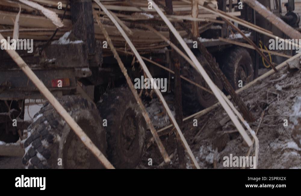 Lorry vehicle stuck in dirt on road at sawmill production yard Stock ...