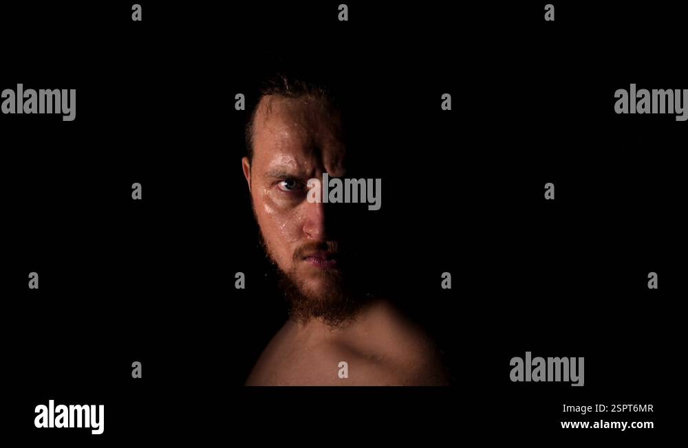 slow motion -man turns his head whilst sweating after training Stock ...