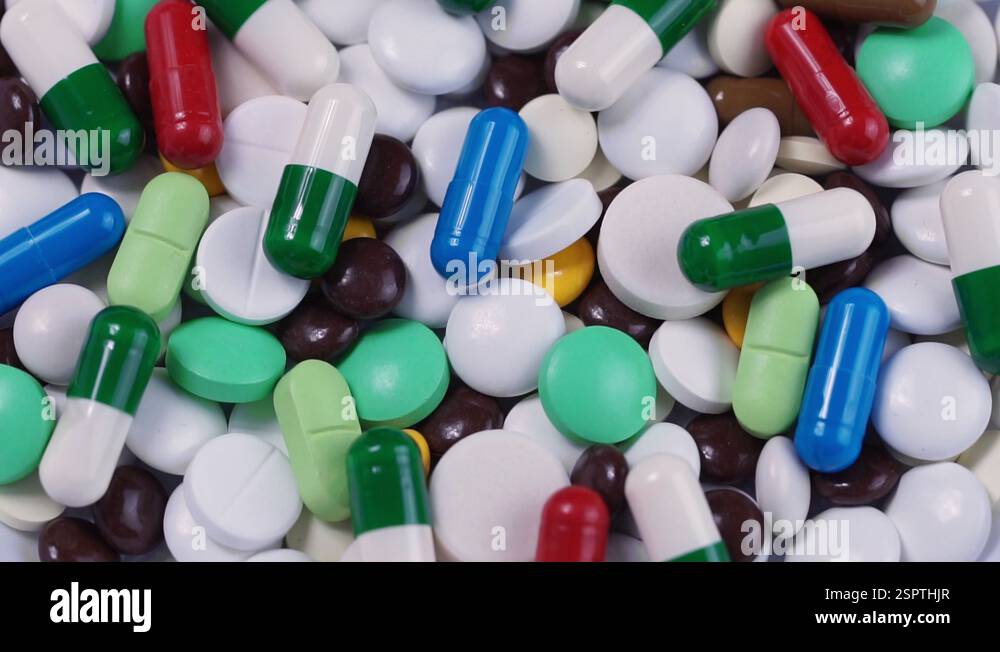 A lot of different medicine pills and capsules Stock Video Footage - Alamy