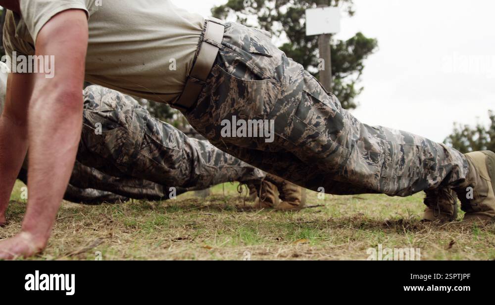 Military soldiers dosing push-ups during obstacle course 4k Stock Video ...
