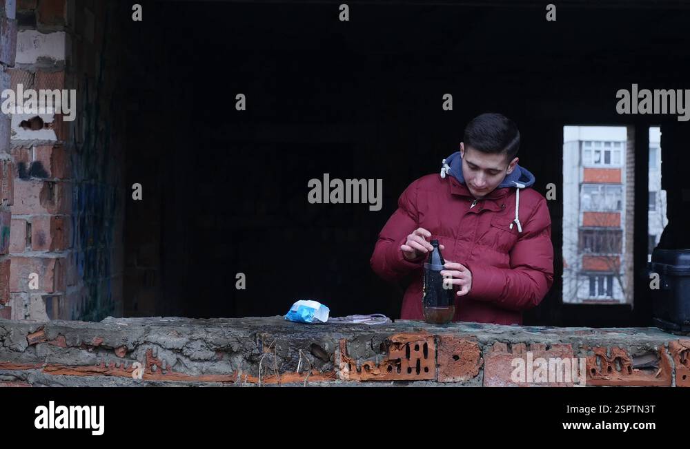 Male addict injects a syringe into a vein. Heroin or meth. Social ...