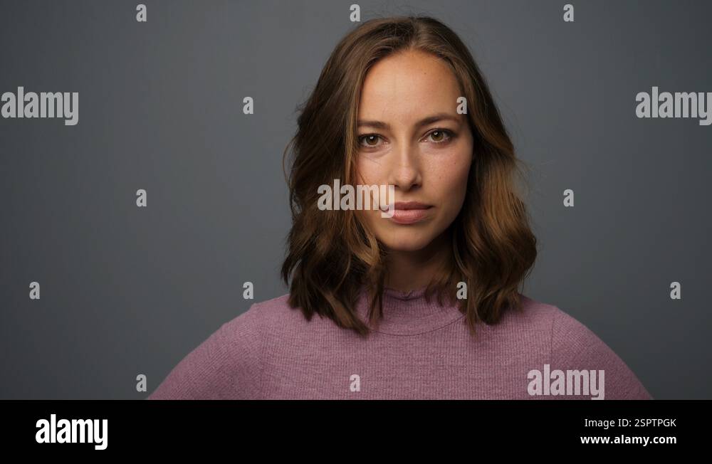 Young woman shaking hair Stock Video Footage - Alamy