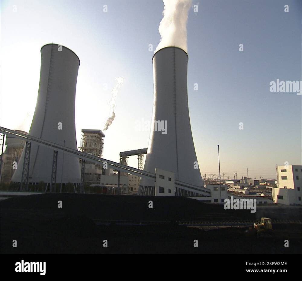 Beijing, China; WS cooling towers and tractor at Shen Hua Sanhe coal ...