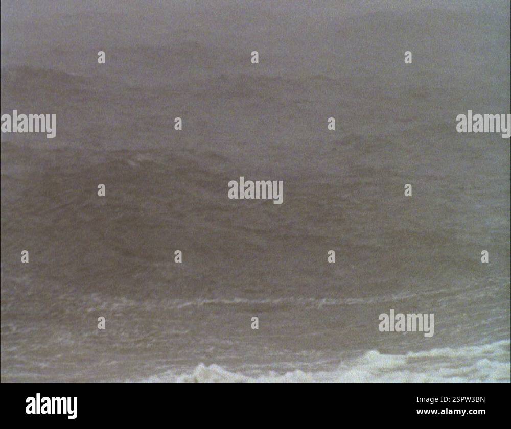 Choppy gray surf with white caps with falling snow Stock Video Footage ...