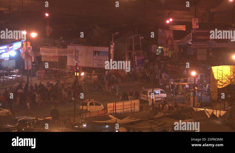 Police car makes way through busy, crowded streets of Kumbh Mela, Night ...