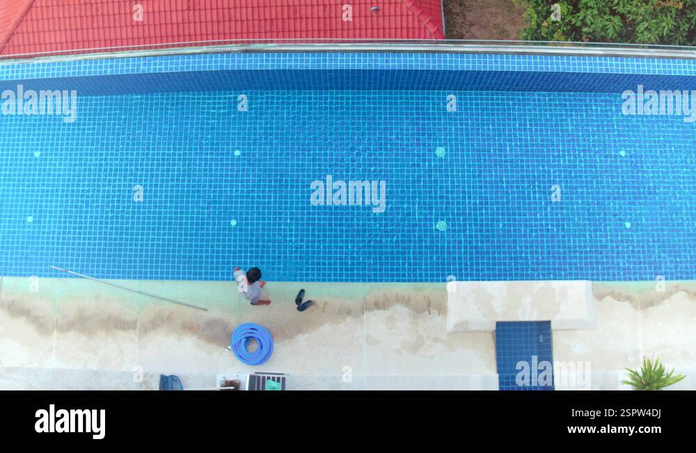 Smooth water surface into floating poo. Transparent blue water in ...