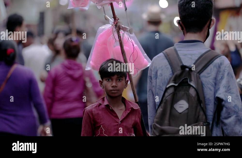 Tibet Nepal Kathmandu poor street child poverty young kid sell cotton ...