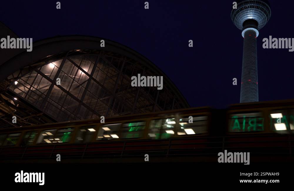 Train Leaving Alexanderplatz Station Tilt Down TV Tower Stock Video ...