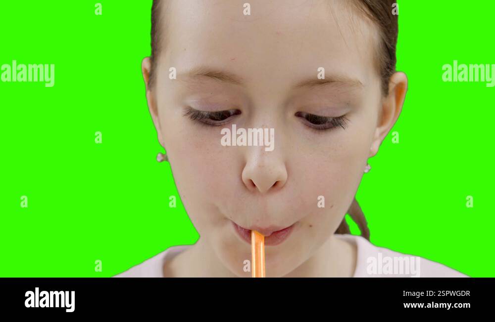 Nice girl drinking through a straw drink. Green screen Stock Video ...
