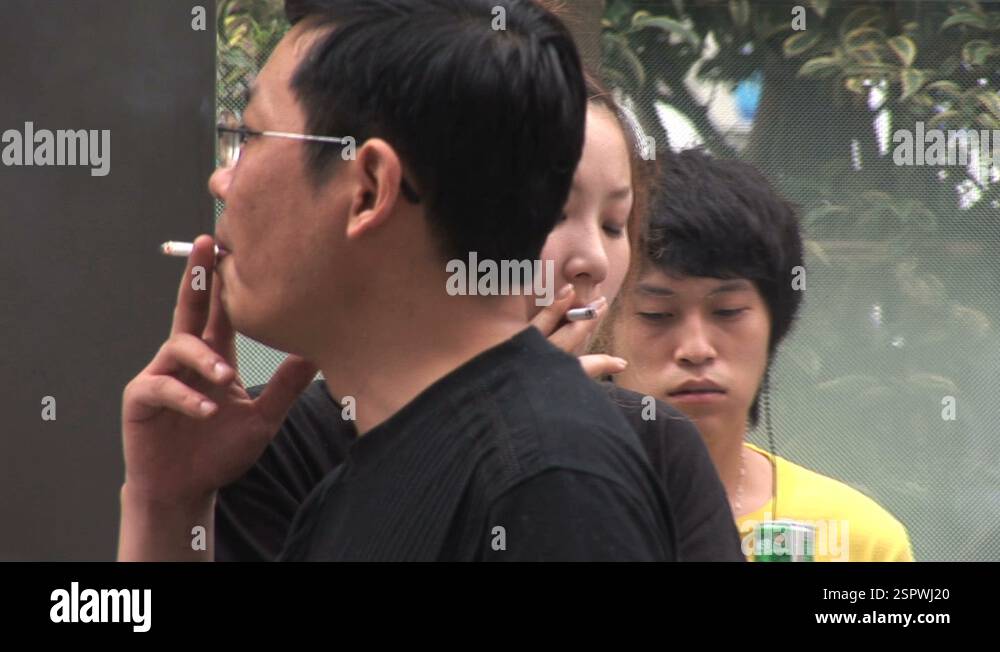 Smokers at Smoking area - in front of Shibuya Station, Tokyo, Japan ...