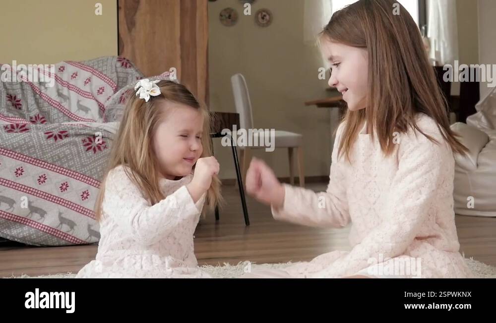 Little girls Kids play a Hand Game at Home having fun Stock Video ...