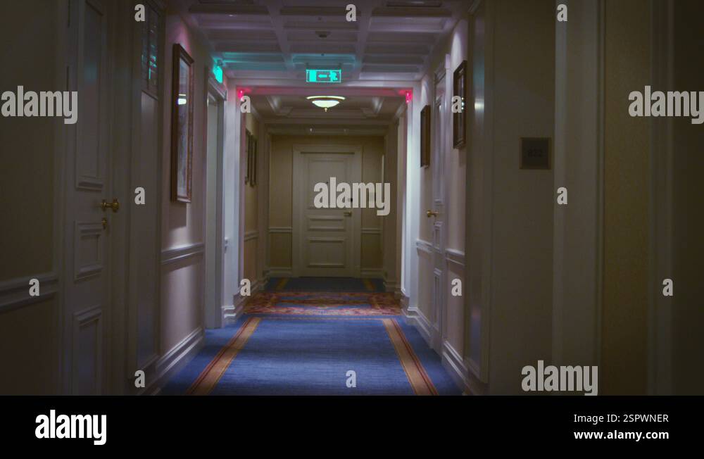 Point of view walking on long corridor in luxury hotel or luxury ...