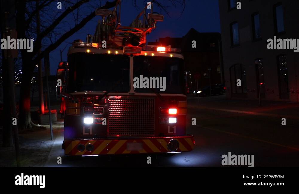 911 call at night with emergency vehicles from fire and rescue service ...