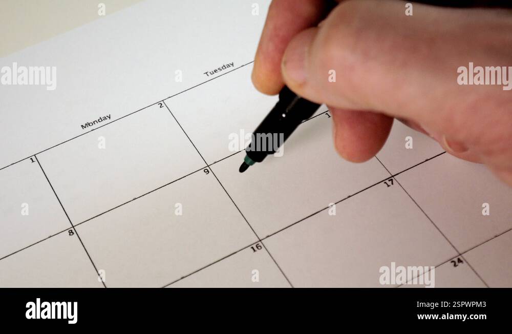 Sign the day in the calendar with a pen, draw a good bad day Stock ...