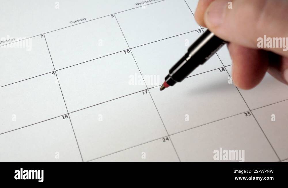Sign the day in the calendar with a pen, draw a good bad day Stock ...