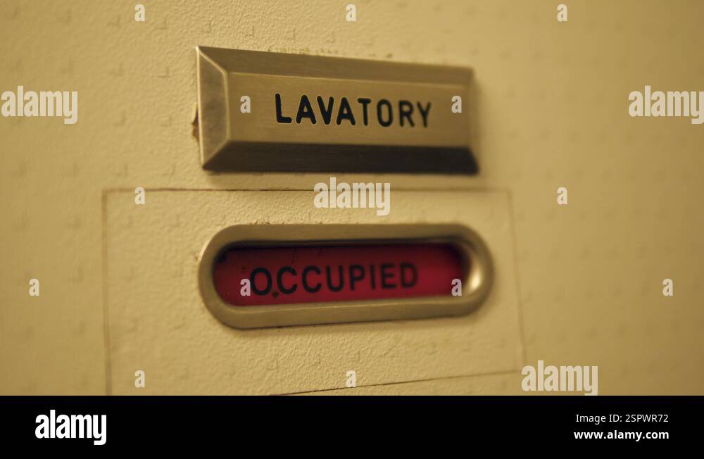 Airplane Lavatory Sign. Vacant and Occupied Message on Toilet Door. 4K ...