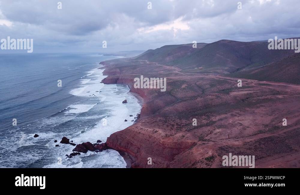Aerial view on Legzira beach at sunset in Morocco Stock Video Footage ...