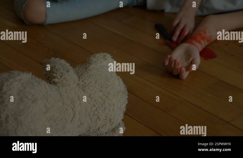 a desperate child in depression sits at the wall of his room, tries to ...