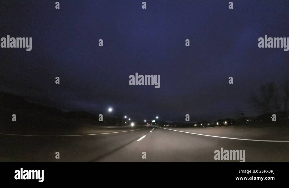 POV-Driving on Interstate highway I25 at night Stock Video Footage - Alamy