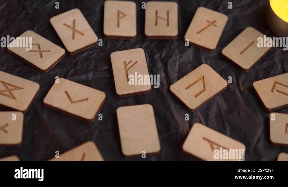 Wooden rune wheel. runic layout and candles, 4k, slow-motion shooting ...