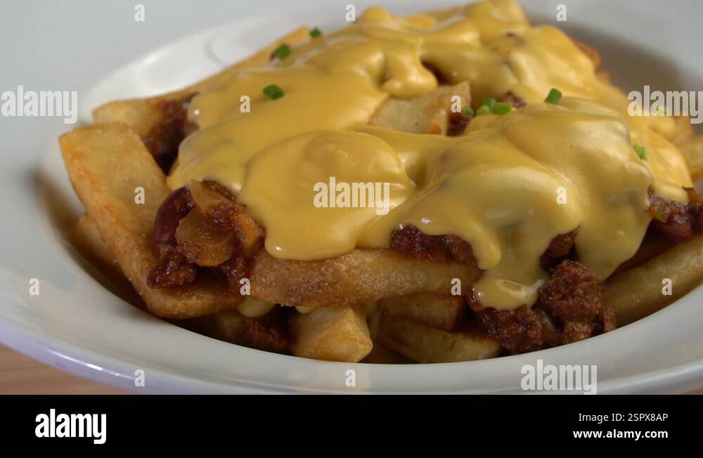 Chives falling on the dish Stock Video Footage - Alamy