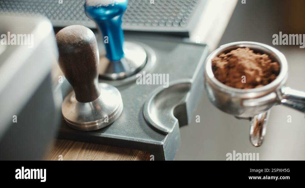Barista at work in the cafe, close-up. Coffee making process in ...