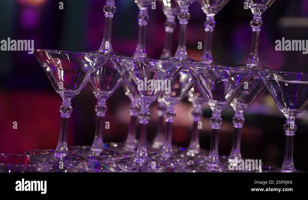 Champagne glass pyramid. Clip. Pyramid of glasses of wine, champagne ...