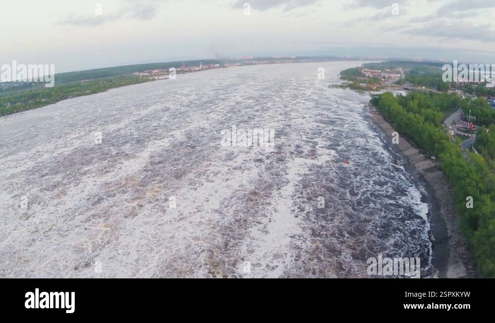 Hydroelectric power station by top view of ridge's dam. Clip. Top view ...