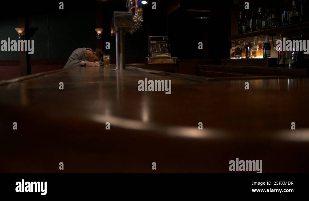 MAN PASSED OUT IN A BAR, MODEL RELEASE Stock Video Footage - Alamy