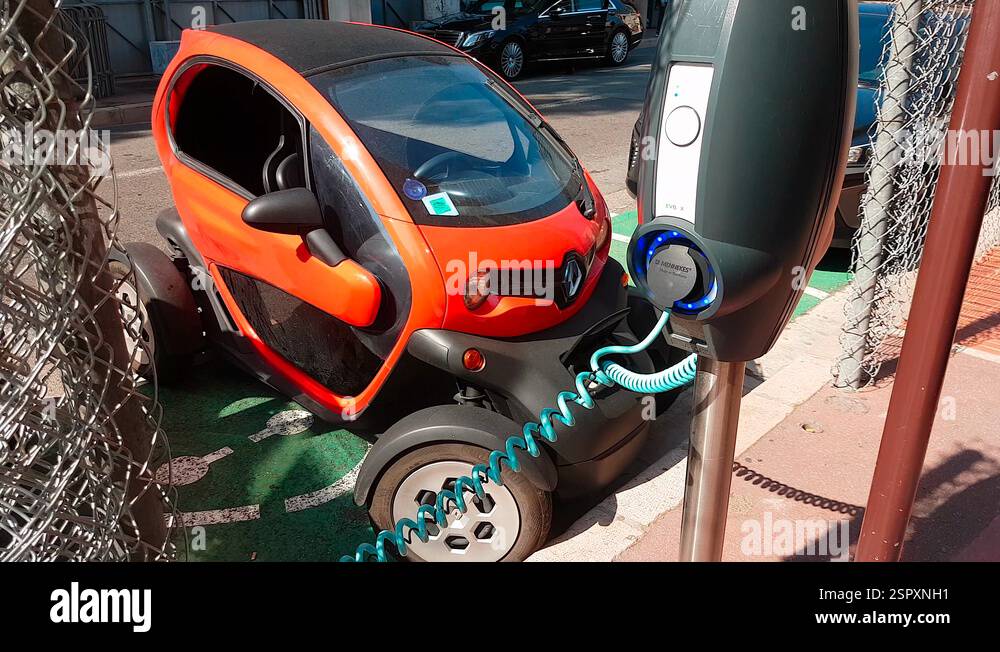 Renault Twizy French Electric Car Charging On Street in Monaco Stock ...