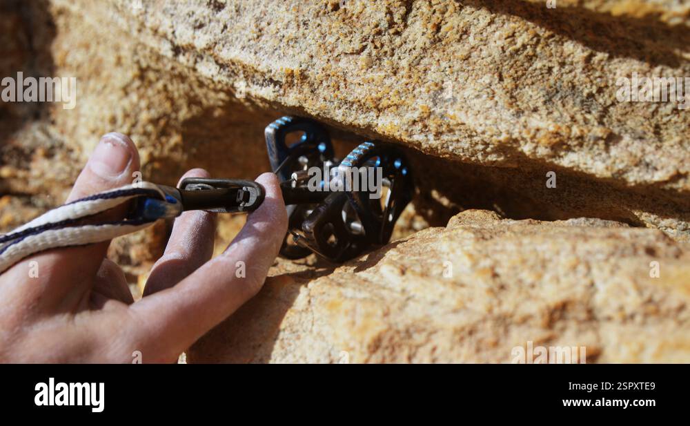 Mountaineer trying to adjust the climbing equipment 4k Stock Video ...