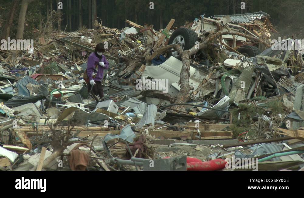 Japan Tsunami Aftermath - Survivors Walk Through Destroyed Downtown ...
