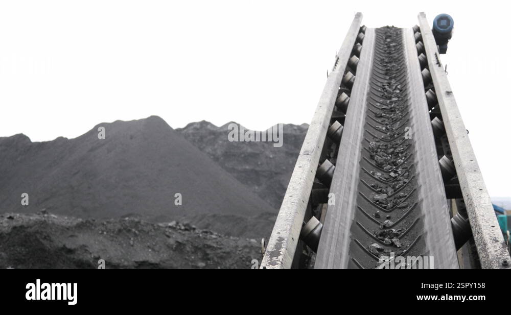 Conveyor belt coal. Machine for loading coal. mining in coal mine Stock ...