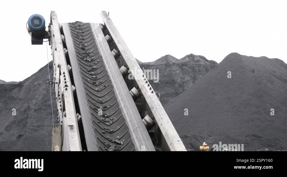 Conveyor belt coal. Machine for loading coal. mining in coal mine Stock ...
