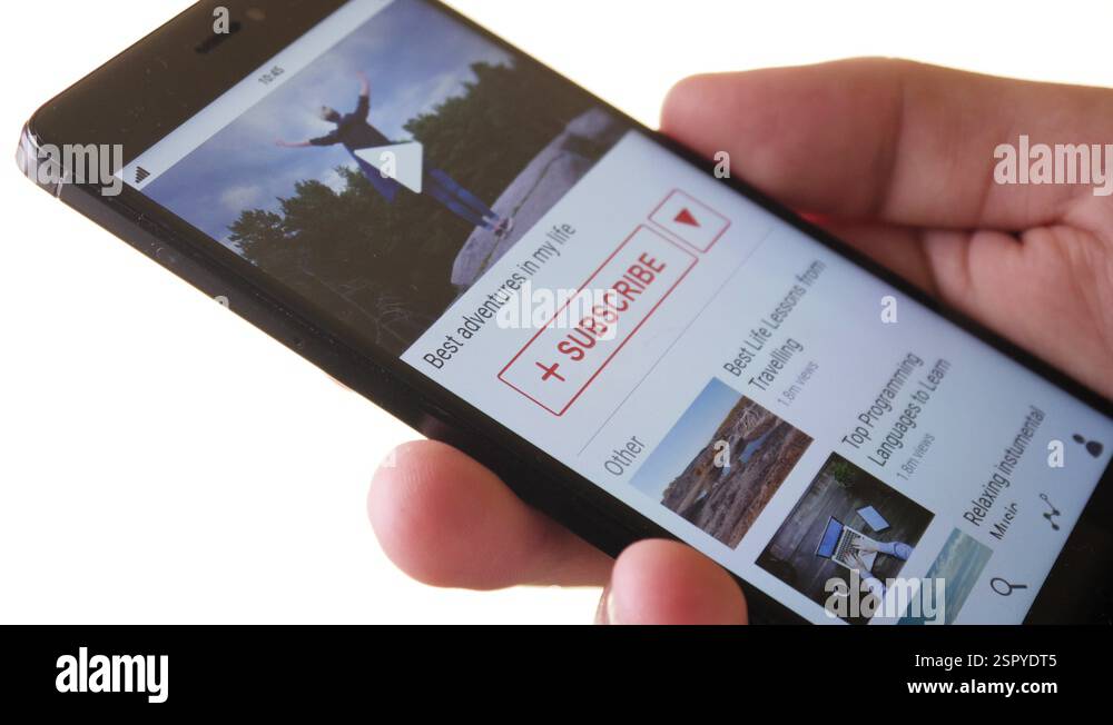 Pressing subscribe button on social media on social media app Stock ...