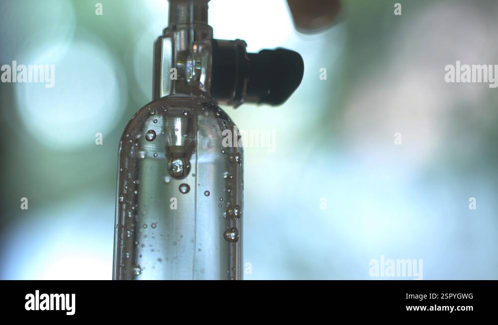 Intravenous drip of medicine at the hospital on blurred bokeh ...