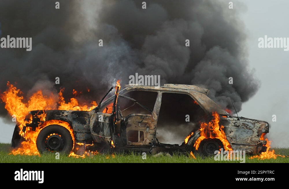 Burning car in green field, Car on fire and smoke Stock Video Footage ...