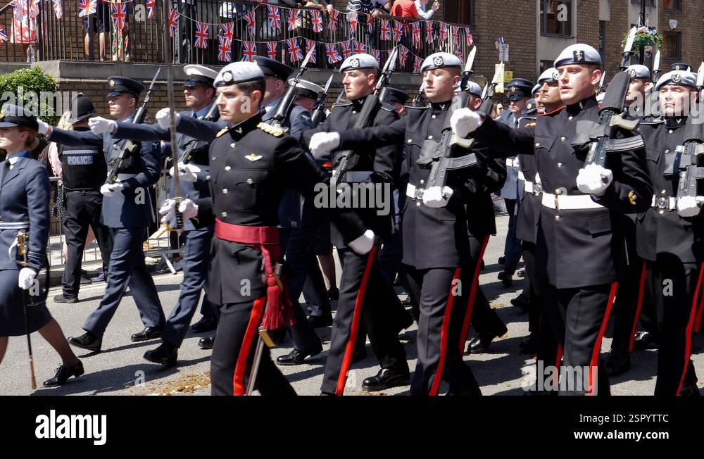 Sailors, soldiers and Royal Air Force parade in honor of Britain's ...