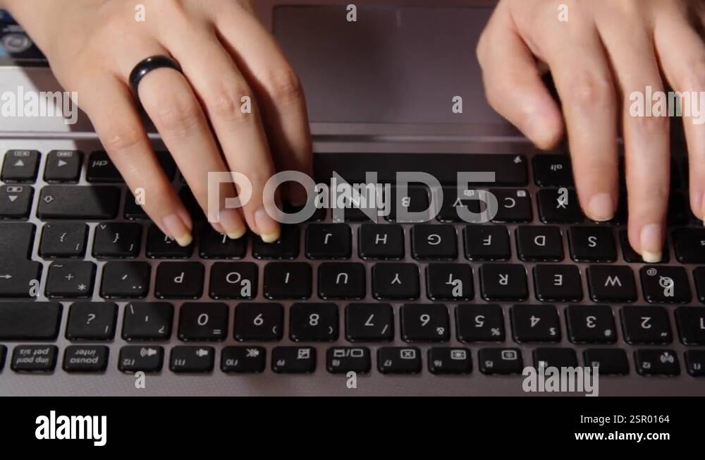 High angle of female hands typing on laptop keyboard Stock Video ...