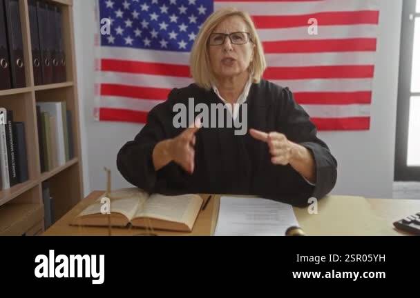 Woman judge with blonde hair delivering a speech in an american ...