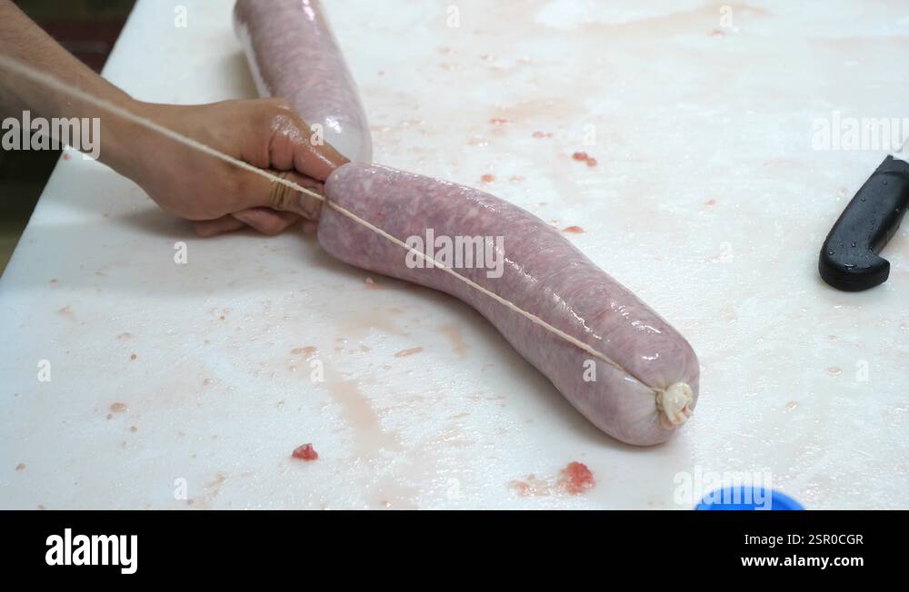 Food industry, traditional production of salami in Italy, slow motion ...