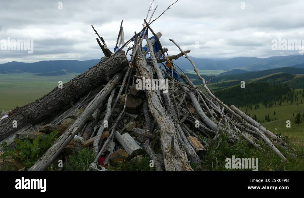 Obo (ovoo) is a sacred object in the form of a pile of rocks and a hut ...