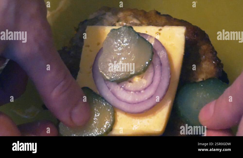 burger assembly process Stock Video Footage - Alamy