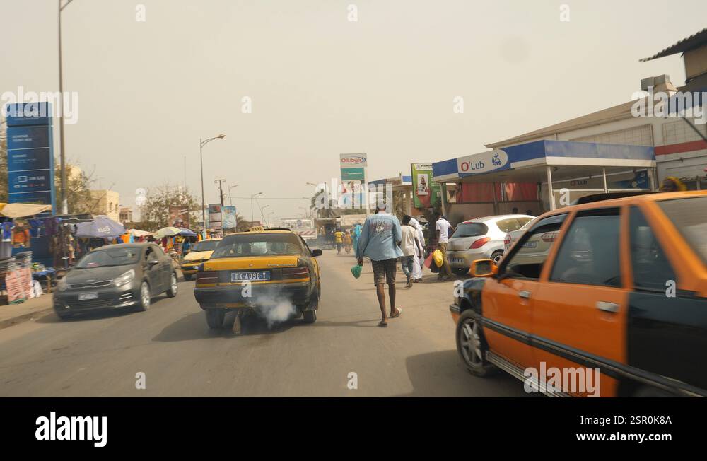 Africa: old taxi air pollution. Dakar, Senegal Stock Video Footage - Alamy