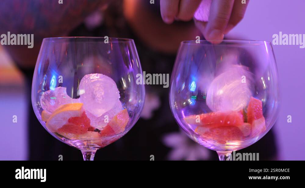 Putting ice for drink preparation in 4K Stock Video Footage - Alamy