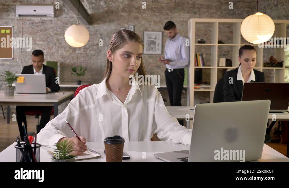 Young busy business people are working in office, networking with ...