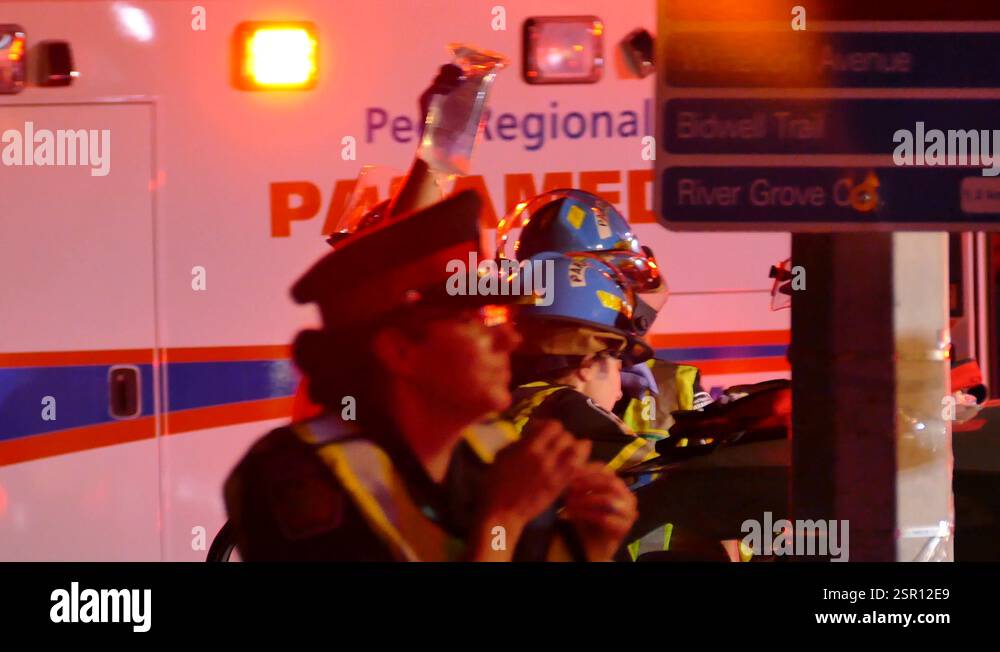 Paramedic Talking While IV Fluid Is Being Applied During Car Crash ...